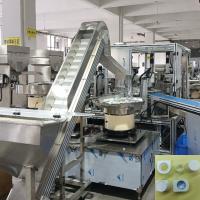 China High Flexibility Milk Heli Cap Assembly Machine With Index Motion Operation Type for sale
