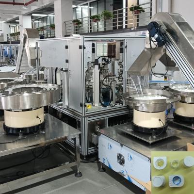 China Two To Ten Cavities Milk Cap Heli Cap Assembly Machine 1 Person Operation for sale