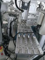China Heli cap, milk cap and juice cap assembly machine for sale