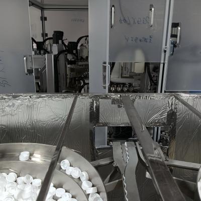 China Heli Cap Assembly Machine with Touch Screen and Frequency Conversion for sale