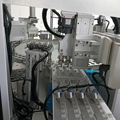 China Heli Cap Assembly Machine for Milk and Screw Caps, Servo-Driven for sale