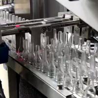 China Automatic IV Bag Ports Assembly Machine 14000 Caps/Hour 5kW for sale
