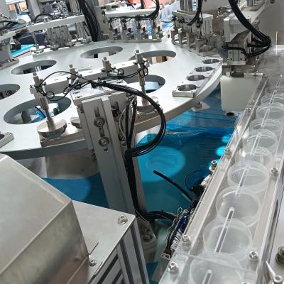 China Automated urine cup assembly machine, compatible with feeding elevators and connectable to injection moulding machines, enhances product assembly efficiency and reduces labour requirements. for sale
