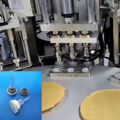 China Automatic IV Bag Spike Ports and Injection Ports Assembly Machine with Servo Mechanism 8000-15000pcs/hr and 99% Qualified Rate for sale