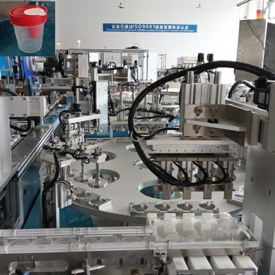 China Fully Automatic High Efficiency Urine Cup Assembly Machine with 2500-7500pcs/h Capacity and 99% Satisfactory Rate for sale