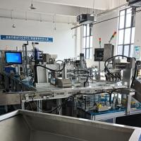 China Fully Automatic High Efficiency Urine Cup Assembly Machine with 2500-7500pcs/h Capacity and 99% Satisfactory Rate for sale