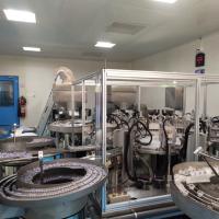 China Double Port Euro Cap Assembly Machine for IV Bottles with 4000-12000 Caps per Hour and 99% Qualified Rate for sale