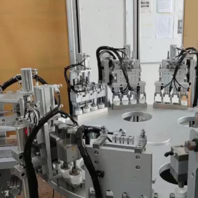 China 220V Voltage Desiccant Cap Assembly Machine with 100% Qualification Check and Vibrating Feeder for Pharmaceutical Use for sale