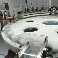 China Automatic Urine Cup Assembly Machine with 99% Qualified Rate 2500-10000pcs/hr Easy to Use Operation for sale