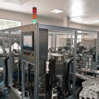 China Automatic IV Infusion Peel-foil Cap Assembly Machine with 4000-12000 Caps per Hour and 99% Qualified Rate for sale