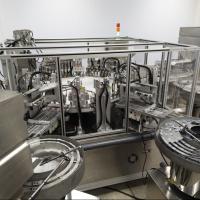 China Euro Cap Assembly Machine with 4000-12000 Caps per Hour, 99% Qualified Rate, and PLC Control System for Automatic Infusion Cap Assembly for sale