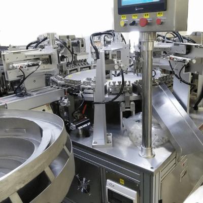 China Automatic Euro Cap Assembly Machine with Touch Screen Operation for 4000-12000 Caps per Hour and 99% Qualified Rate for sale