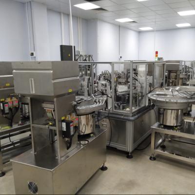 China Euro Cap Assembly Machine with 14000-15000pcs/h Capacity, PLC Control, and Stainless Steel Construction for IV Infusion Caps for sale