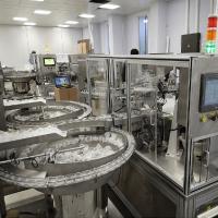 China Euro Cap Assembly Machine with PLC Control Touch Screen and Servo Motor Drive for 4500-12000 Caps per Hour for sale