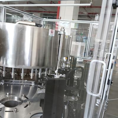China Continuous Motion Double Fold Cap Assembly Machine with PLC Control, 14000-18000pcs/h, Stainless Steel + Aluminum Alloy Construction for sale