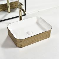 China Hotel Bathroom Sanitary Ware Plating Golden Countertop Face Hand Wash Basin for sale