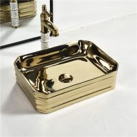 China Hotel Bathroom Sanitary Ware Plating Golden Countertop Face Hand Wash Basin for sale