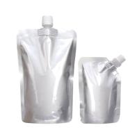 China Customized Color Liquid Spout Pouch For Beverage Clear Plastic Pouches 100ml for sale