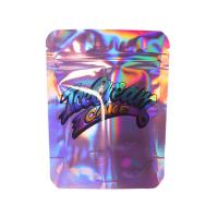 China Customized Pattern Stand Up Pouch Holographic Plastic Packaging Bag With Ziplock for sale