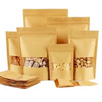China Biodegradable Food Grade Kraft Paper Stand Up Pouch with Heat Seal Transparent Window Packaging for sale
