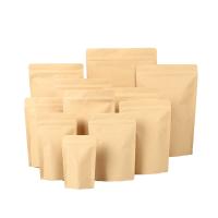China Biodegradable Food Grade Kraft Paper Stand Up Pouch with Heat Seal Transparent Window Packaging for sale