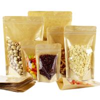 China Biodegradable Food Grade Kraft Paper Stand Up Pouch with Heat Seal Transparent Window Packaging for sale