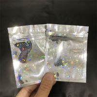 China Stand Up Holographic Zipper Packaging Bag Flat Pouches Small Laser Zip Lock Plastic Bags for sale
