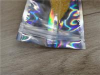 China 0.5OZ Holographic Stand Up Pouch Silver ziplockk Foil Bag Pouches With Tear Notch for sale