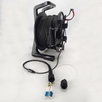 China OEM Retractable Tactical Fiber Optic Cable 100m 200m 500m Armored Patch Cord for sale