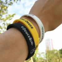 China Custom Logo Printed Silicone Wristbands For Promotion And Advertising Multi color Night Glow Luminous Silicone Bands for sale
