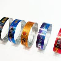 China Hot Sale Shiny Laser Glitter Promotional Wristband Waterproof Laser Paper Bracelet Adult Kid Events Admission Wristband for sale
