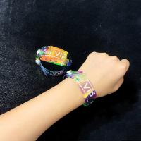 China Supplier Wholesale Waterproof Shiny Wristband Custom Words Party Gift Park Event Glitter Transparent Laser PVC Wristband for sale