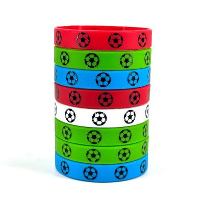China Embossed Silicone Bracelets Custom Soccer Ball Game Souvenir Gift Wrist Bands in Various Colors for sale