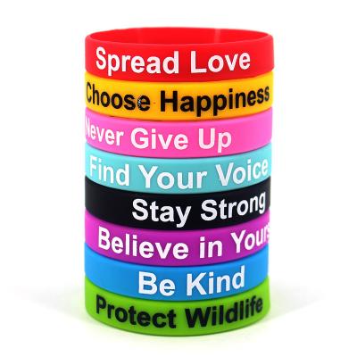 China Silicone Bracelets Custom Match Slogan Watchword Printed Wrist Bands for Festival Promotion Souvenirs for sale