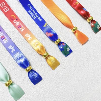 China Adjustable Park Admission Wristbands Custom Logo Polyester Woven Cloth for Concerts and Promotions for sale
