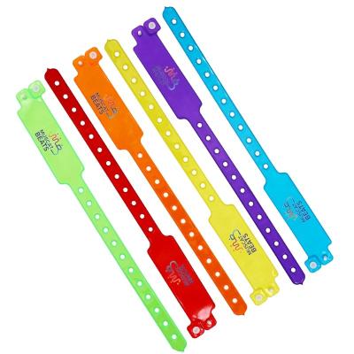 China Vinyl PVC Waterproof Event Party Gift Wristband with Customizable Design and Neon Fluorescent Color Option for sale