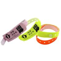 China Disposable Custom Neon Fluorescent PVC Wristband with Tabs and Heat Transfer Printing for sale
