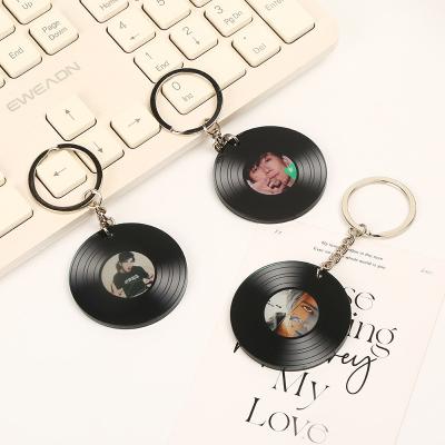 China Transparent Custom Acrylic Keychains Durable Black Album CD Singer Idol Printed With Metal Ring for sale