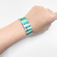 China Disposable Adjustable Neon Rainbow Laser Glitter Festival Bracelets For Unisex Event Concert for sale