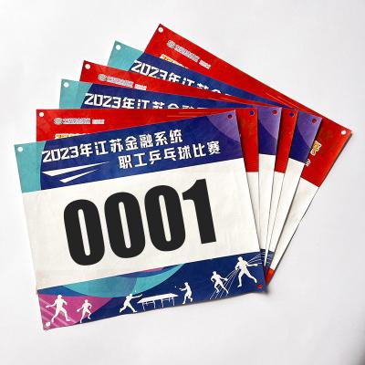 China Customized Waterproof Tyvek Paper Number Bib Book for Track and Field Running Races 0.5mm Thickness High Tear Resistance for sale