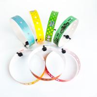 China Disposable Pvc Wristbands Supplier Water Resistant Customizable Logo Text Event Party Bracelet for sale