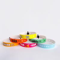 China Disposable Pvc Wristbands Supplier Water Resistant Customizable Logo Text Event Party Bracelet for sale