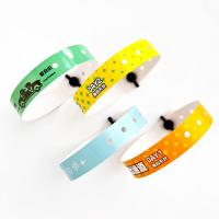 China Disposable Pvc Wristbands Supplier Water Resistant Customizable Logo Text Event Party Bracelet for sale