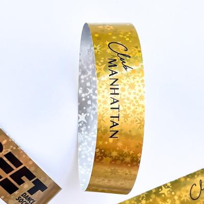 China Plastic Golden Star Pattern Disposable Wristband Holographic With Logo Text Printed for Party/Events Occasion for sale