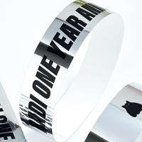 China Fashionable Silver Holographic Disposable Soft Paper Bracelet Glitter Style Event Entrance Ticket with Logo Printed for sale