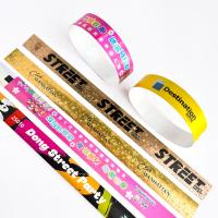 China Disposable Golden Star Pattern Logo Text Printed Wristband Unisex Fashionable Holographic Appearance for sale