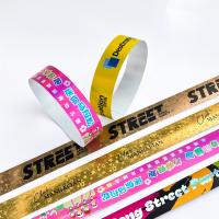 China Disposable Golden Star Pattern Logo Text Printed Wristband Unisex Fashionable Holographic Appearance for sale