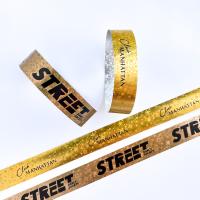 China Disposable Golden Star Pattern Logo Text Printed Wristband Unisex Fashionable Holographic Appearance for sale
