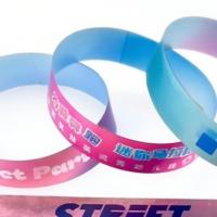 China Personalized Colorful Holographic Paper Wristband Customized Slogan Wristband for sale