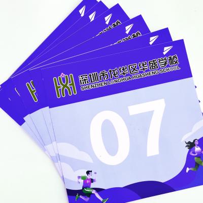 China 0.5mm Thickness Race Bib Numbers Screen Printing Method and in White Red Blue or Customized Colors for sale